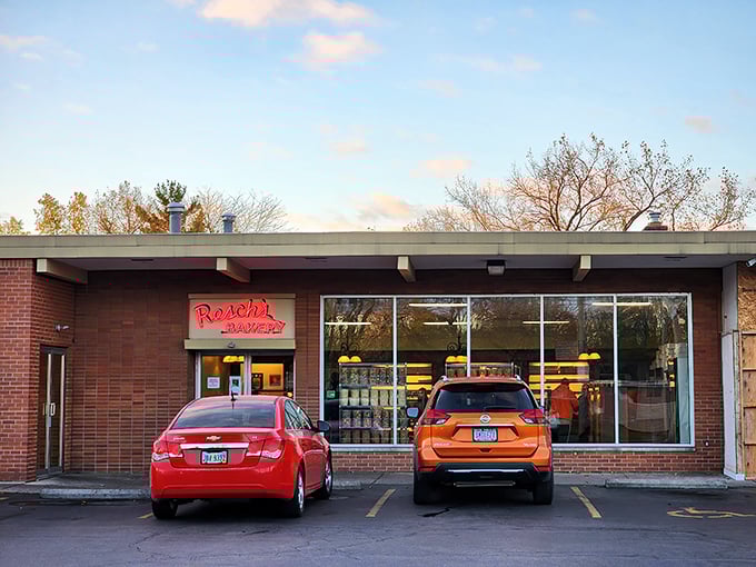 Classic brick and big windows reveal the magic happening inside - fresh donuts calling your name all day.