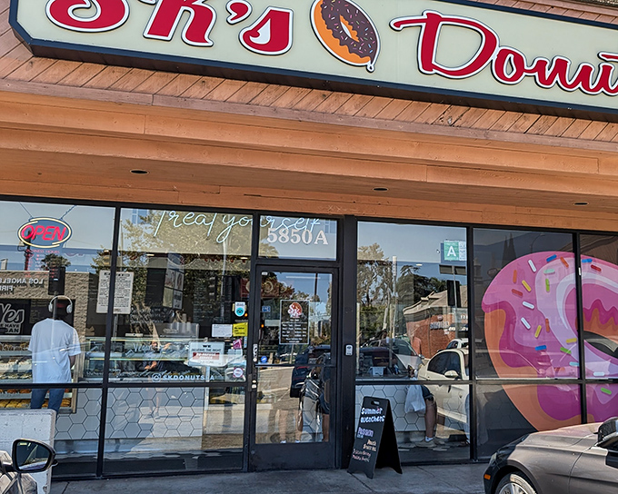 Giant pink donuts in the windows aren't just decoration - they're a delicious declaration of intent.
