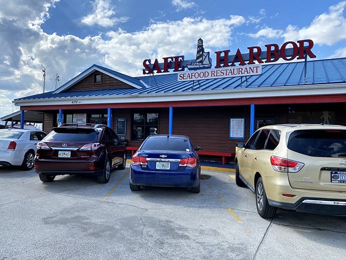 Blue roof, red trim, full parking lot&mdash;the universal sign language for "incredible seafood inside." Locals know the code.