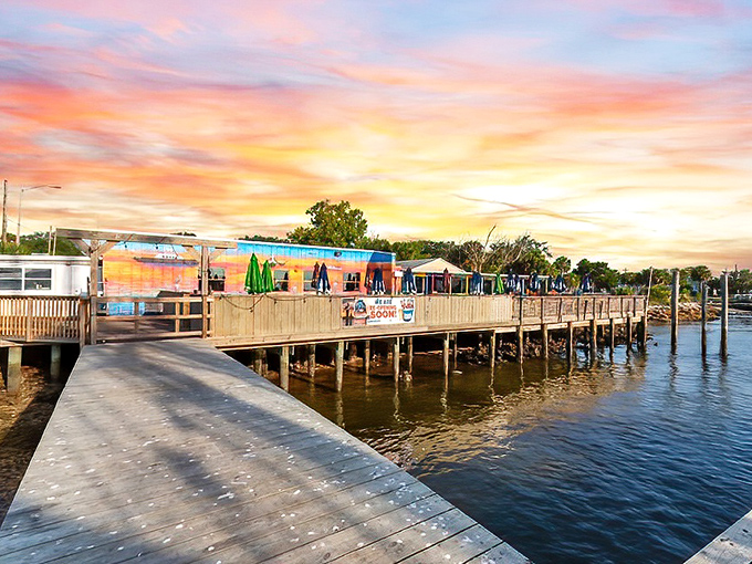 Sunset magic at the marina. Nature provides the perfect backdrop for seafood that tastes like a warm Florida hug.