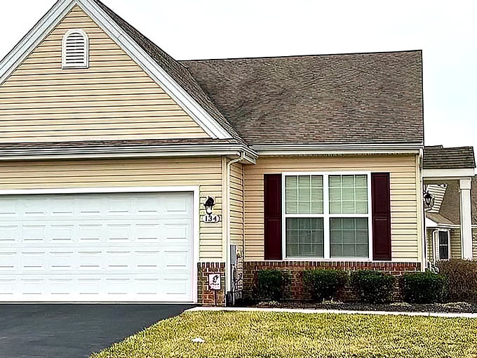 This Spring Meadow residence showcases classic brick accents and shutters&mdash;retirement living with curb appeal that would make HGTV proud.