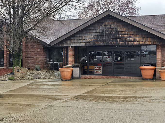 This rustic farmhouse facade whispers "comfort food" louder than any neon sign ever could.