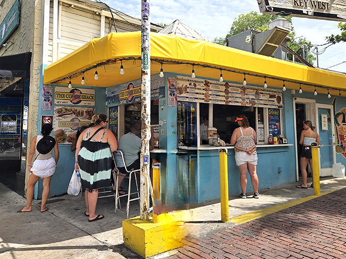 This bright blue beacon on Duval Street serves up conch fritters that'll make you forget everything else.