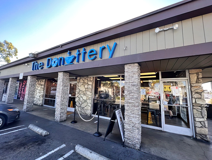 Stone pillars and modern design create the perfect backdrop for seriously old-school donut craftsmanship.