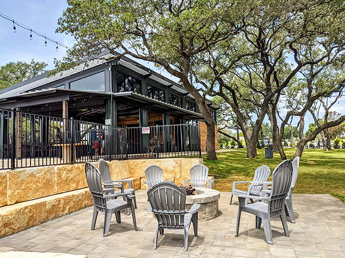 The Good Lot's outdoor seating area whispers "stay awhile" with its fire pit and shade trees - nature's perfect drinking companion.