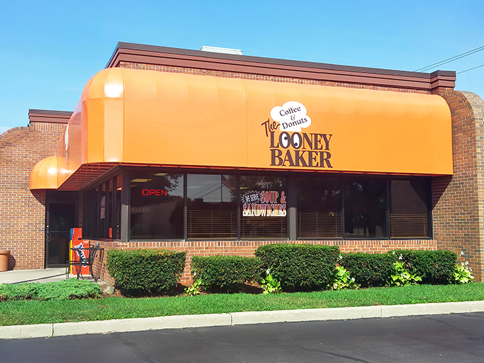 That bright orange facade isn't just eye-catching &ndash; it's practically a beacon calling all donut lovers to sweet salvation.