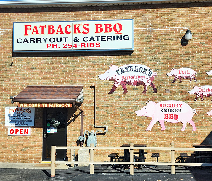 Those painted pigs on the brick wall aren't just decoration - they're a delicious promise kept.