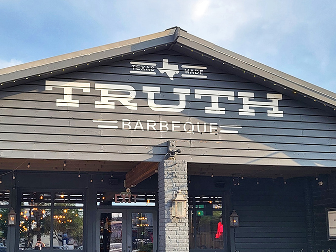 Truth BBQ's sleek exterior promises serious barbecue business - no frills, just pure smoky perfection waiting inside.