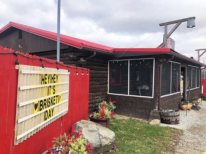 "Hey hey, it's brisket day!" Uncle Beth's rustic cabin promises smoky treasures within those log walls.