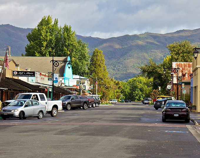 Mountain views frame this perfect small-town street like a postcard from your best vacation.