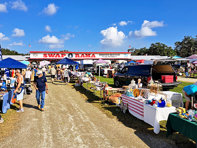 "SWAP-O-RAMA" indeed! Webster's flea market transforms ordinary fields into a bustling marketplace where one person's junk becomes another's treasure.