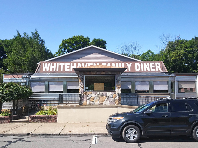 White Haven Family Diner's stone-and-siding facade stands ready to welcome hungry travelers. Comfort food with a view of small-town America.