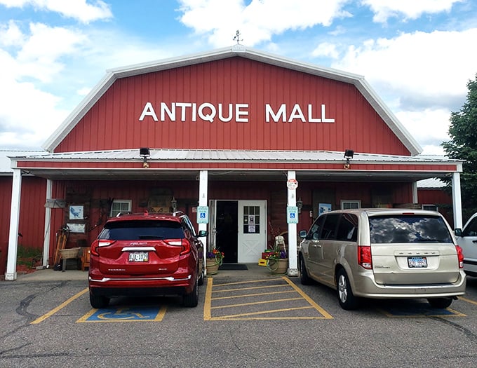 Red barn, blue sky, endless possibilities. Wisconsin Dells Antique Mall stands proud like a temple to nostalgia.