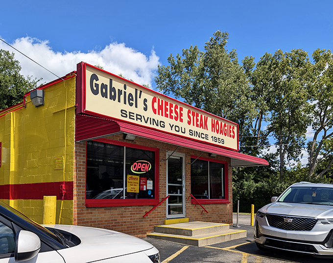 Bold red and yellow stripes announce serious sandwich business has been happening here for decades.