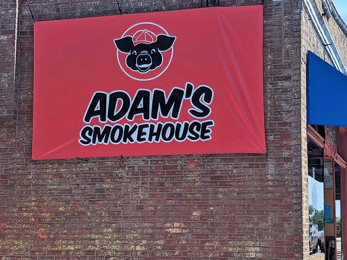 The cheerful pig logo tells you everything: this place takes barbecue seriously but never forgets to have fun.