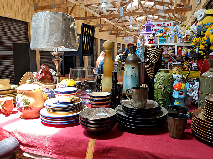 Pottery paradise meets dishware heaven! This colorful display at Barnyard Flea Market would make Marie Kondo both thrilled and terrified.
