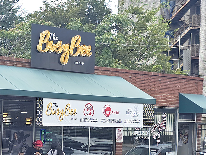 The Busy Bee sign buzzes with promise, drawing chicken lovers like moths to perfectly seasoned flame.