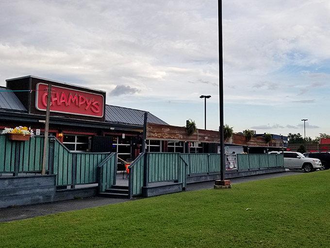 The Champy's sign glows like a beacon for fried chicken pilgrims. You can practically hear the crunch through the photo!