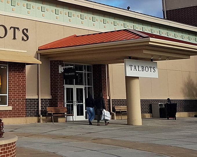 The Talbots entrance welcomes shoppers into a world where designer quality meets outlet prices in perfect harmony.