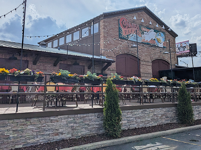 This patio setup whispers "stay awhile" &ndash; exactly what great pizza places should do.
