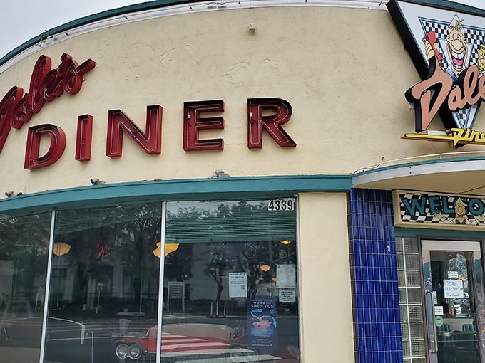 That classic blue tile work hints at the timeless comfort food waiting inside this neighborhood treasure.