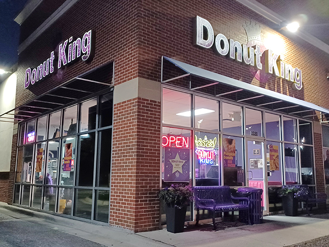 By night, Donut King glows like a beacon of hope for those who believe calories after dark don't count.
