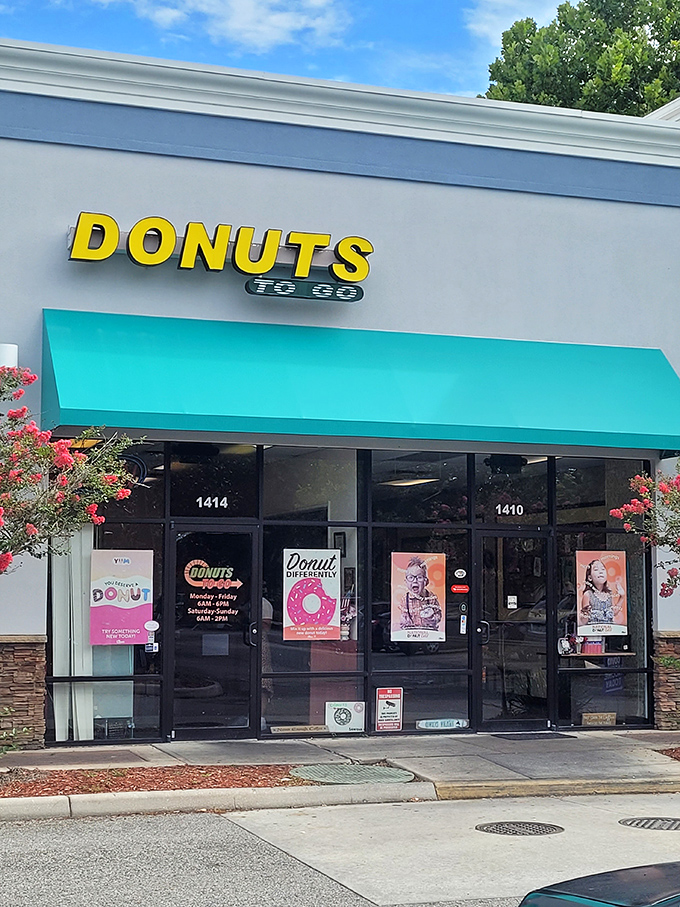 The yellow sign beckons like a sunrise. Donuts To Go's classic storefront hides treasure within.