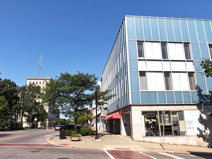 Sun-drenched streets of Elyria invite leisurely strolls past storefronts. No need to rush when living costs this little.
