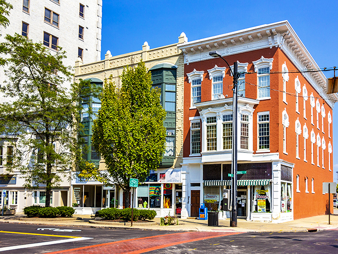 Tree-lined streets and honest architecture make Elyria feel like home before you even unpack your bags.