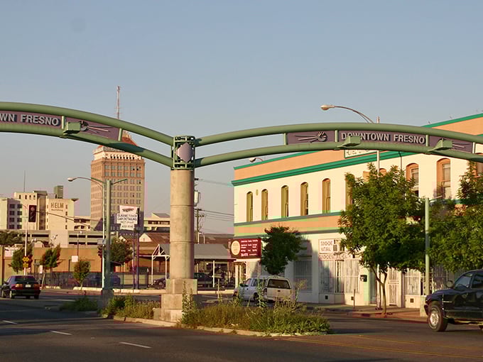 Downtown Fresno's green archway frames a city reinventing itself with quiet determination and hope.