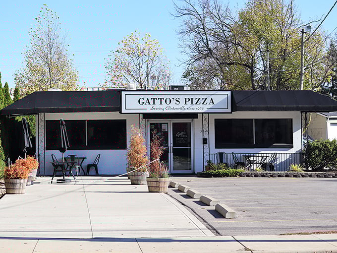 Fall colors frame this Clintonville pizza landmark. Gatto's understated exterior hides decades of pizza perfection within.