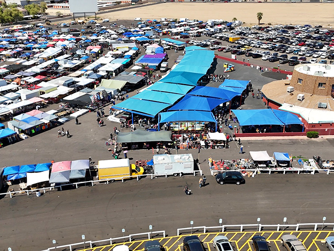 The bird's-eye view reveals organized chaos where hundreds of vendors create a shopping wonderland for savvy hunters.