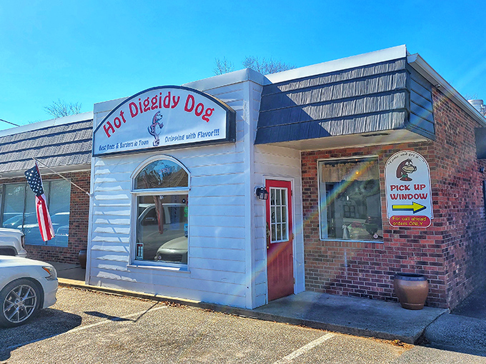 Sunshine makes everything better, especially Hot Diggidy Dog's inviting storefront. That pickup window means you can grab happiness on the go.