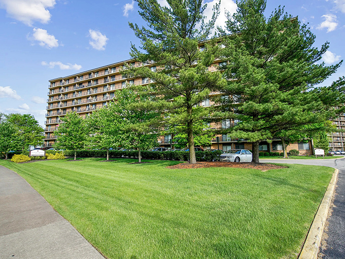 Green lawns frame apartment living that proves you don't need a mansion for the good life.