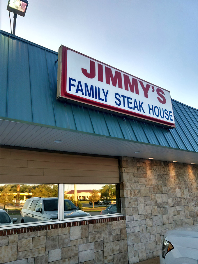The green roof and stone accents whisper "comfort food ahead" to every hungry traveler passing by.