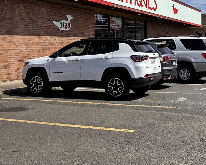 The full parking lot tells the real story: smart shoppers know where to find the good stuff at great prices.