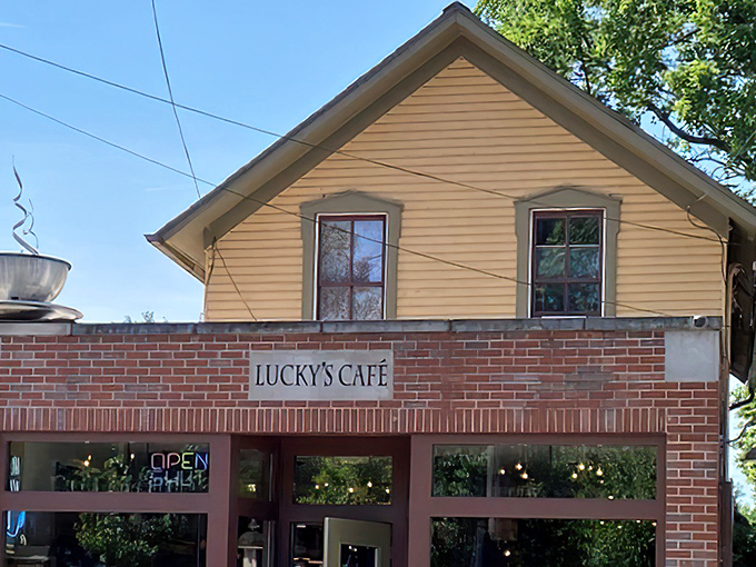 When a house becomes a restaurant, magic happens - especially with that inviting yellow siding and brick foundation.