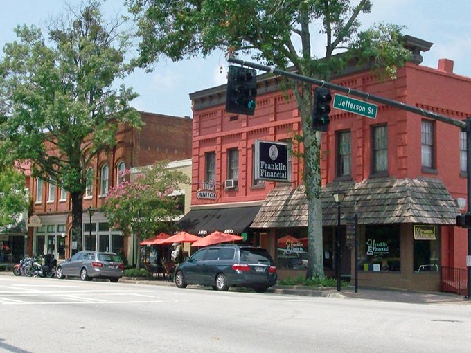 Tree-lined streets create natural galleries where every building tells a Southern story.