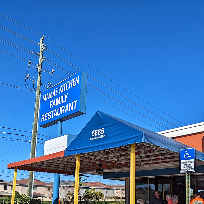 The blue sign says it all - breakfast served all day, because some rules were meant to be broken.