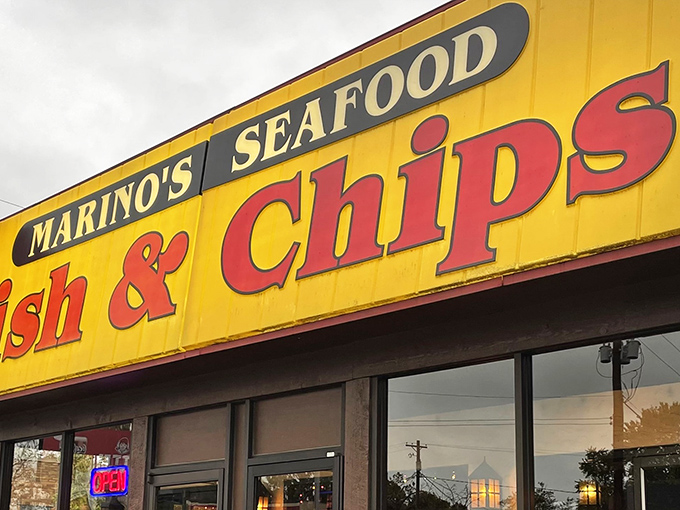 The bold red lettering against sunny yellow siding is like a lighthouse beacon for hungry seafood lovers. Simple, straightforward, and absolutely worth finding.