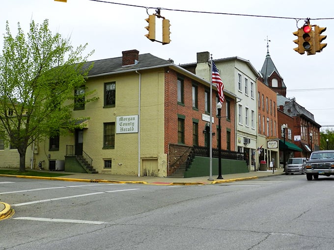 The Morgan County Herald building anchors this intersection where time seems to move at a gentler pace than the rest of the world.
