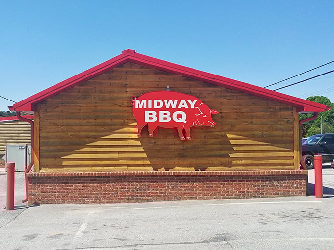Morning light kisses Midway BBQ's blue roof &ndash; a humble temple to the art of slow-cooked pork.