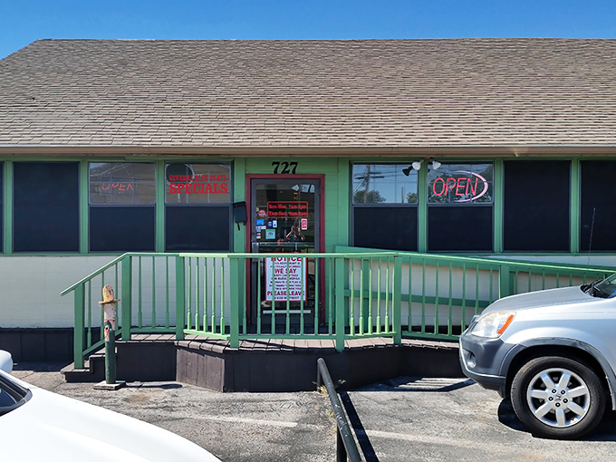 That bright green entrance at Mill Street Diner is like a gateway to comfort food paradise &ndash; simple, welcoming, and unpretentious.