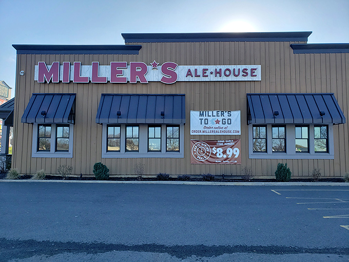 Those blue awnings shelter more than just tables - they protect serious burger craftsmanship.