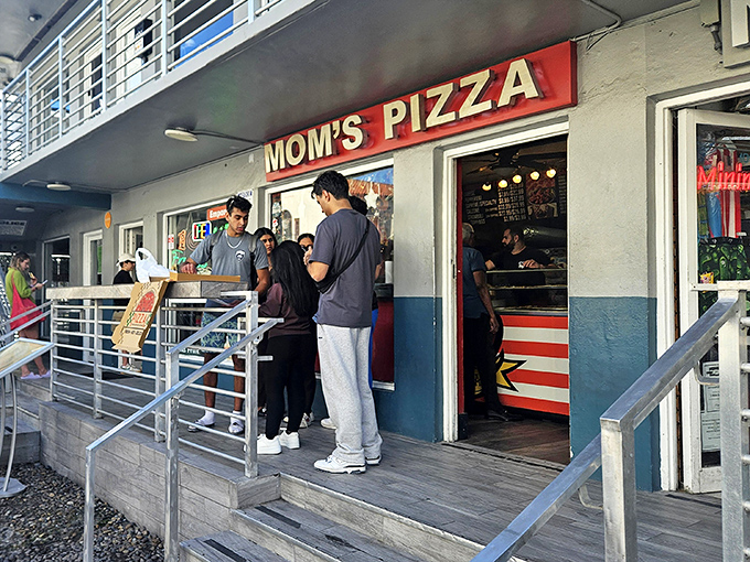When the line forms outside this tiny storefront, you know the locals have found something special worth waiting for.