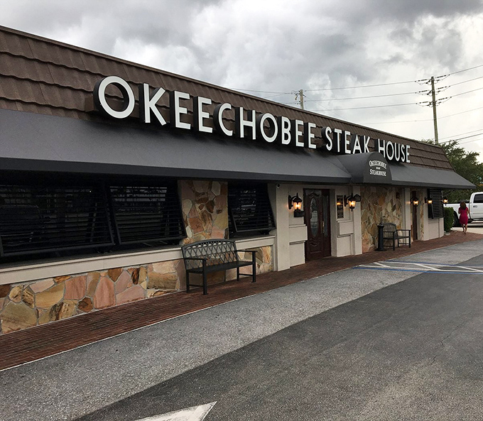 The weathered exterior tells stories of countless satisfied customers who've discovered this neighborhood treasure.