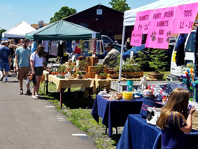 Colorful tents and eager shoppers create the perfect recipe for a successful flea market adventure.