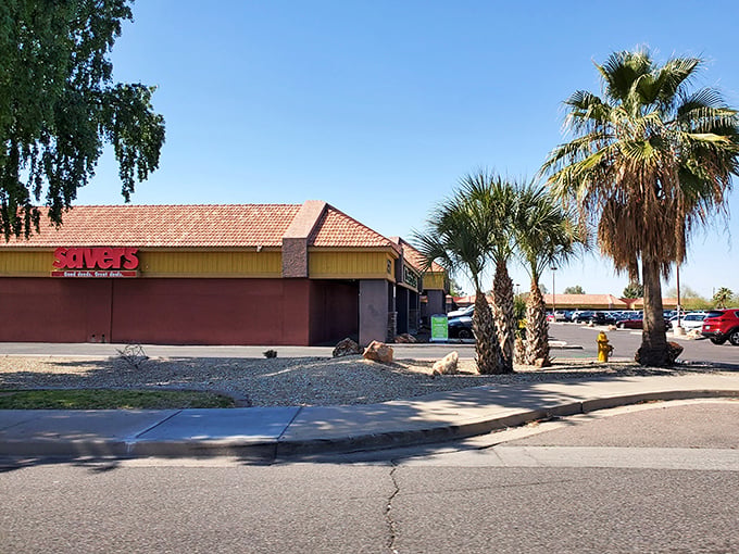 This thrift store fortress beckons with palm trees standing guard over countless hidden shopping treasures.
