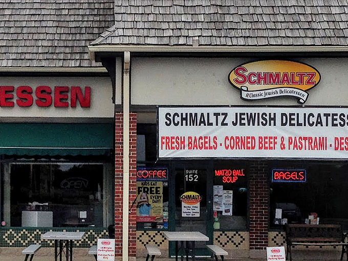 Classic deli signage announces fresh bagels and corned beef - the holy trinity of comfort.