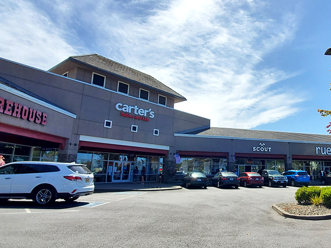 Carter's storefront beckons with kid-friendly fashion deals, the perfect stop after a day building sandcastles.